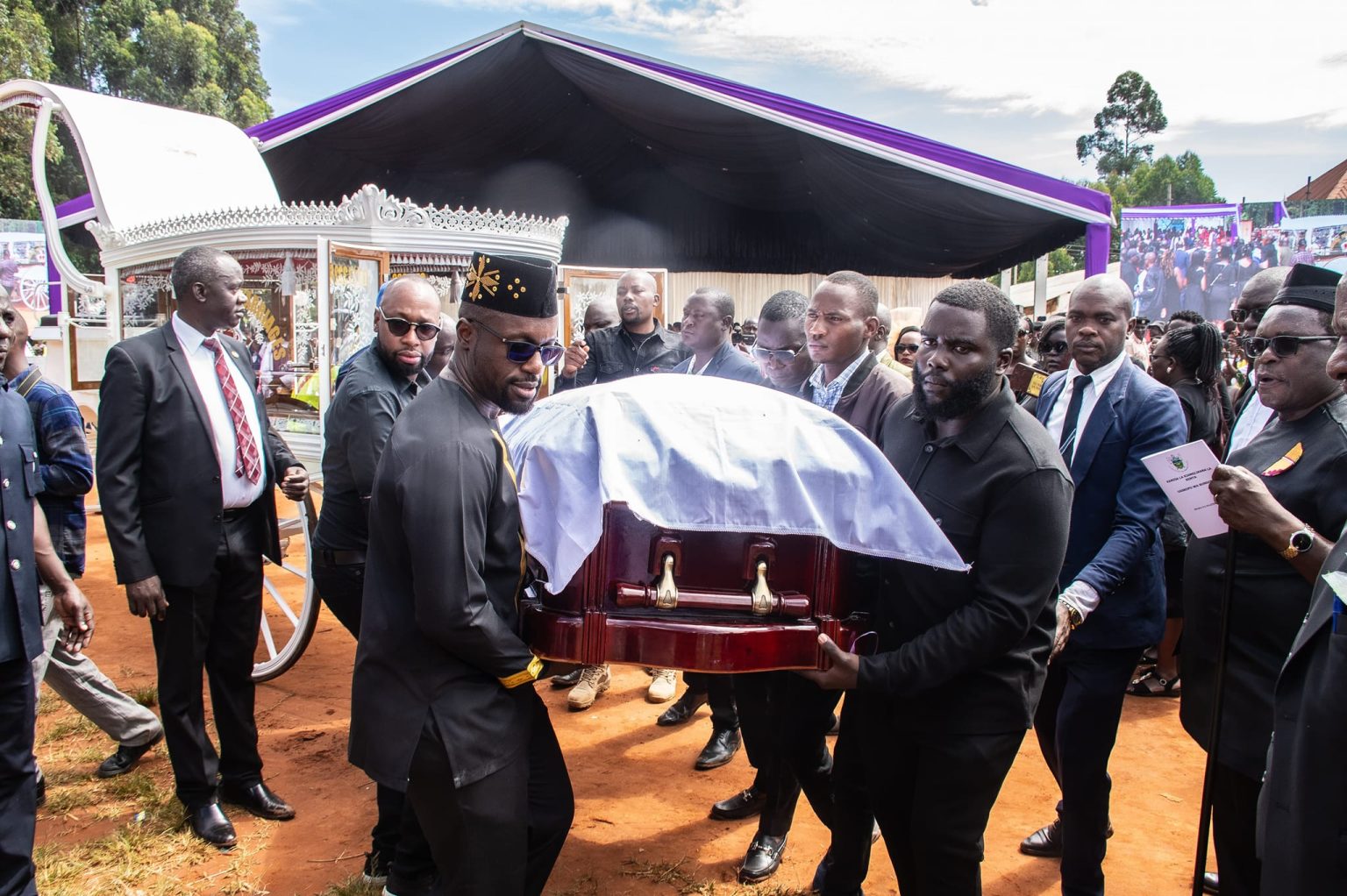 Like a queen: Pomp and colour washes away tears as Mama Rhoda Namaemba ...